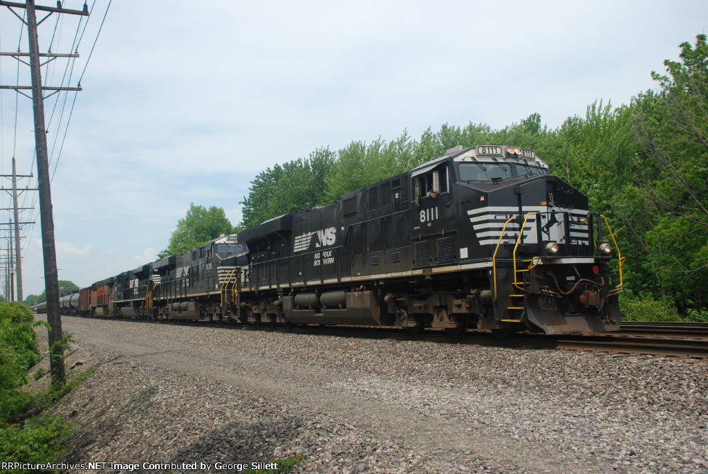 An NS ES44AC leads a mixed freight east.